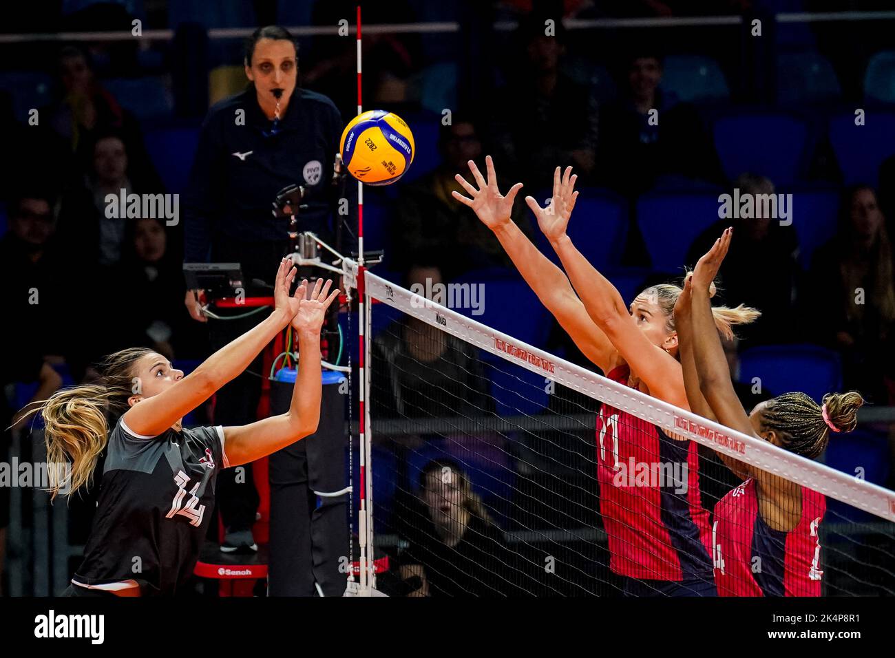 ARNHEM, NETHERLANDS - SEPTEMBER 26: Hilary Howe of Canada plays the ball while Andrea Drews of ...