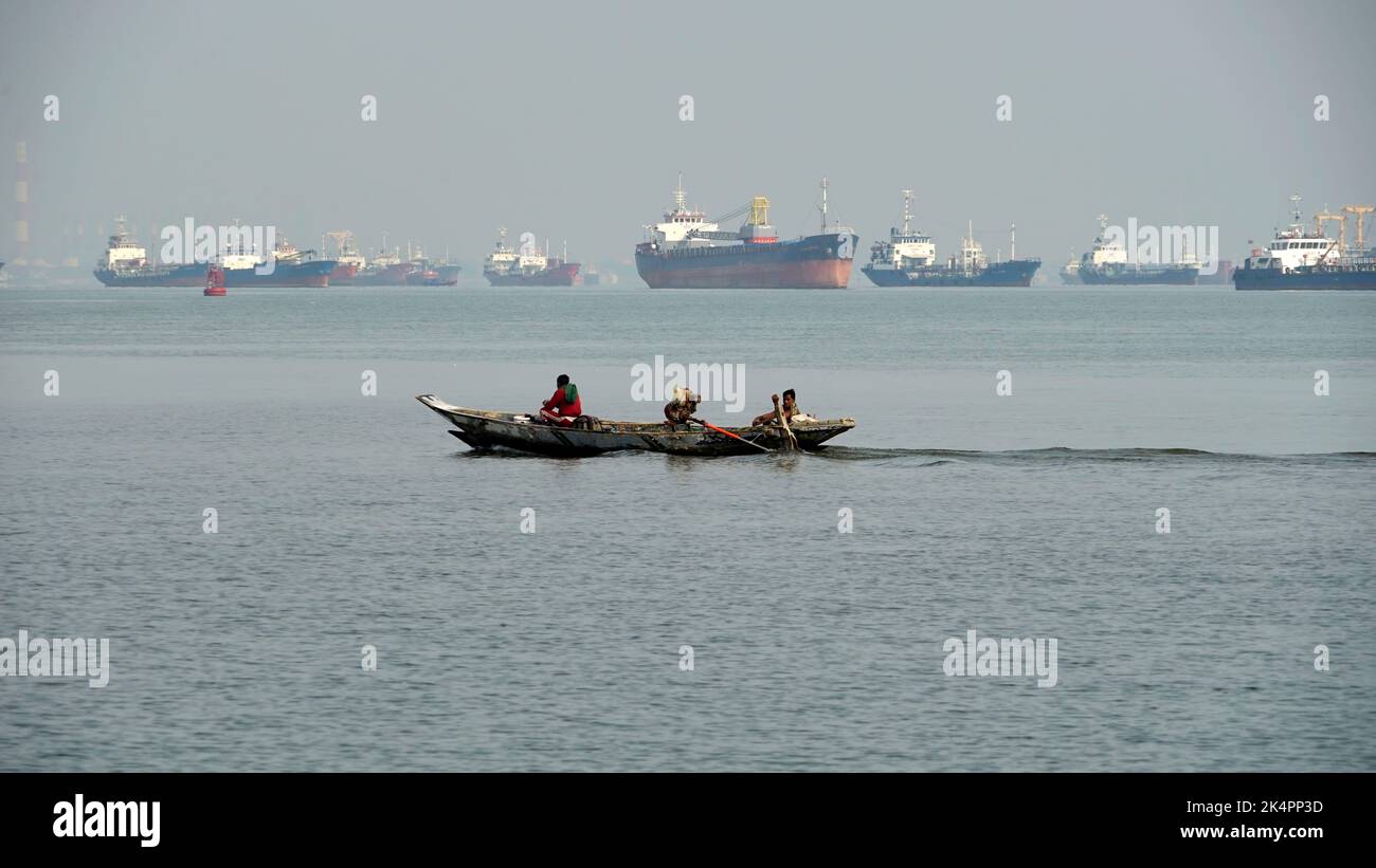 Traditional boat maneuver in Tanjung Perak port, Surabaya, Indonesia on ...
