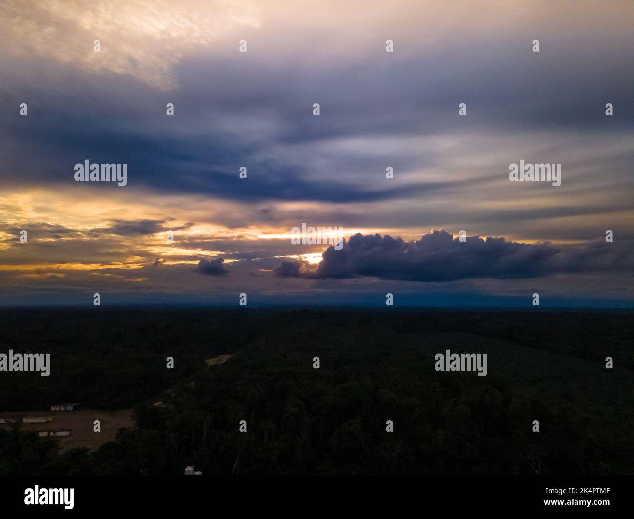 View over sunset over Amazon river with rainforest in Ecuador Stock ...