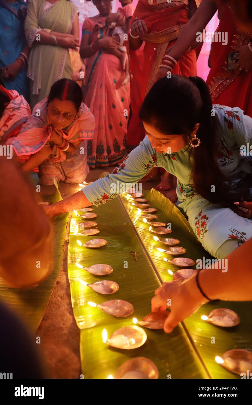 Jamshedpur, India. 03rd Oct, 2022. Hindu devotees perform the rituals ...