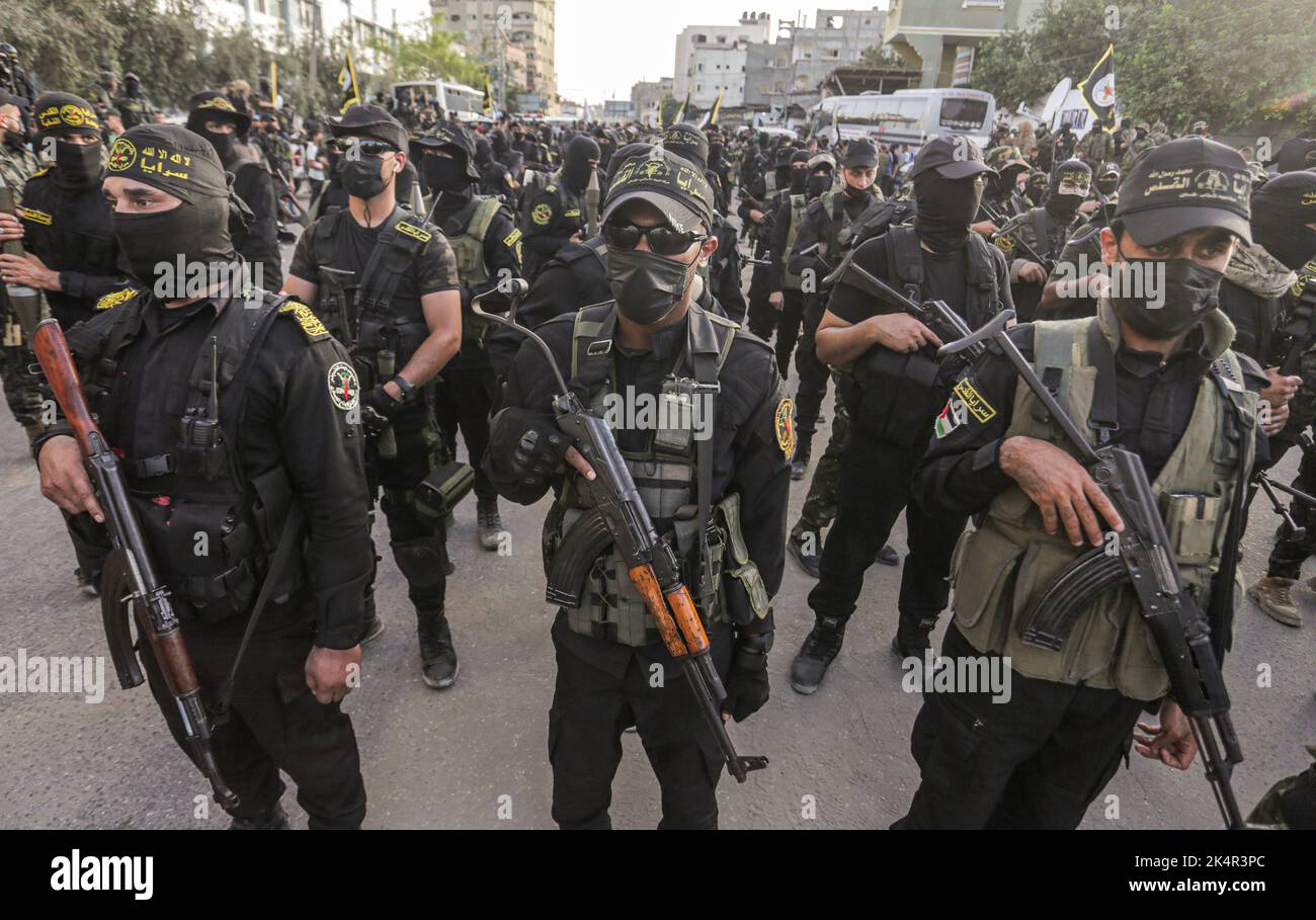 Armed fighters from Saraya al-Quds, the military wing of Islamic Jihad ...