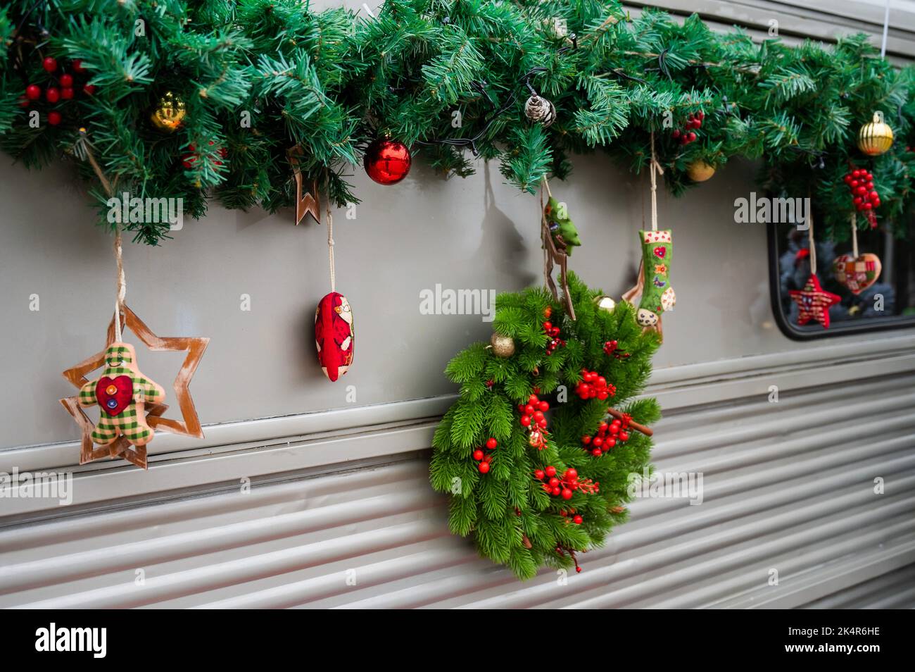 Trailer decorated with a wreath and fir branches for Christmas Stock ...