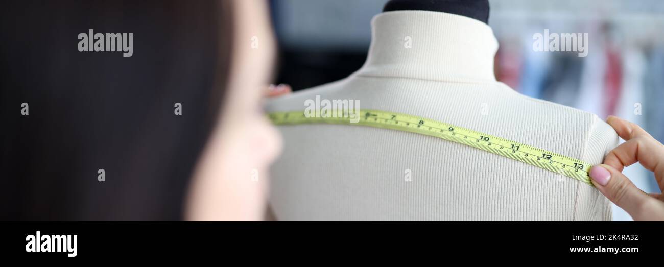 Female fashion designer taking measure hi-res stock photography and ...