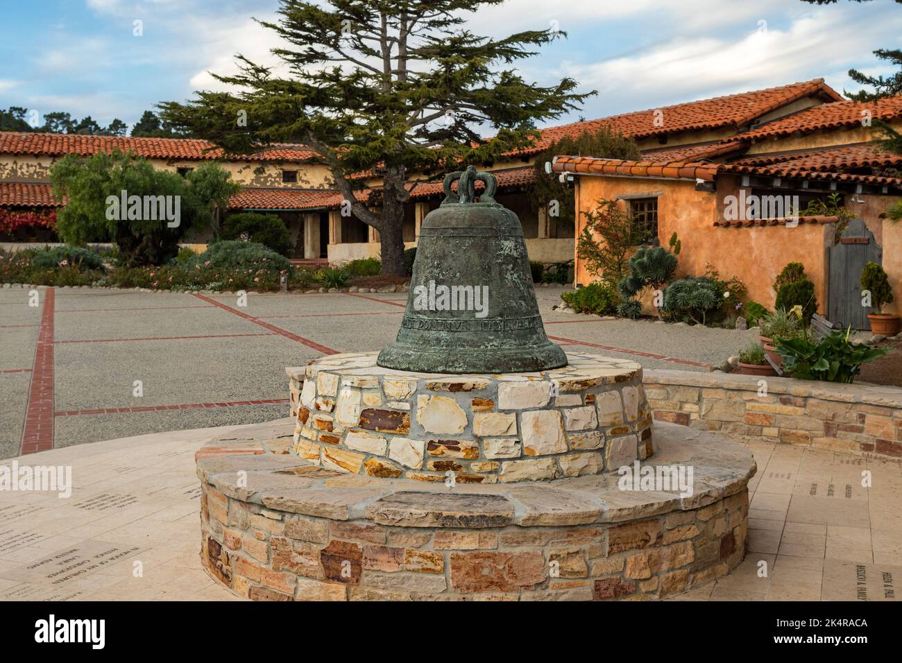 Mission bell in the courtyard, The Carmel Mission Basilica, the mission ...