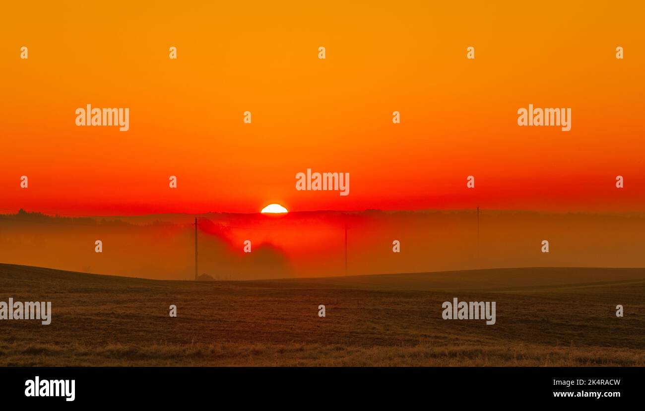 Sunrise, heat and hot weather, orange landscape with sun Stock Photo ...