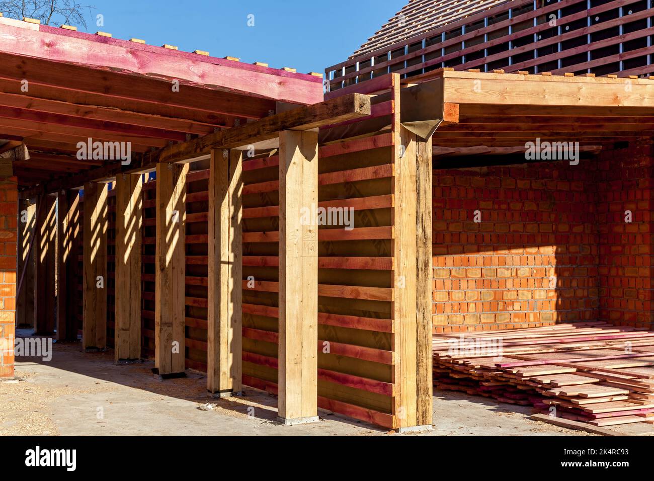 Brick house with a wooden frame for sheathing with metal siding ...