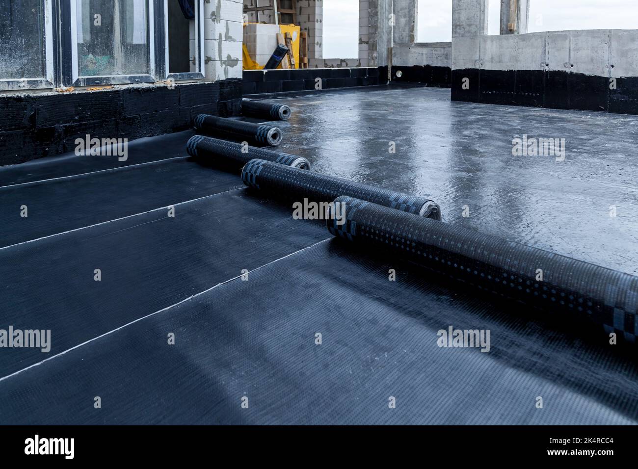Laying and installation of roofing, bituminous waterproofing of an apartment building. Rolled ...
