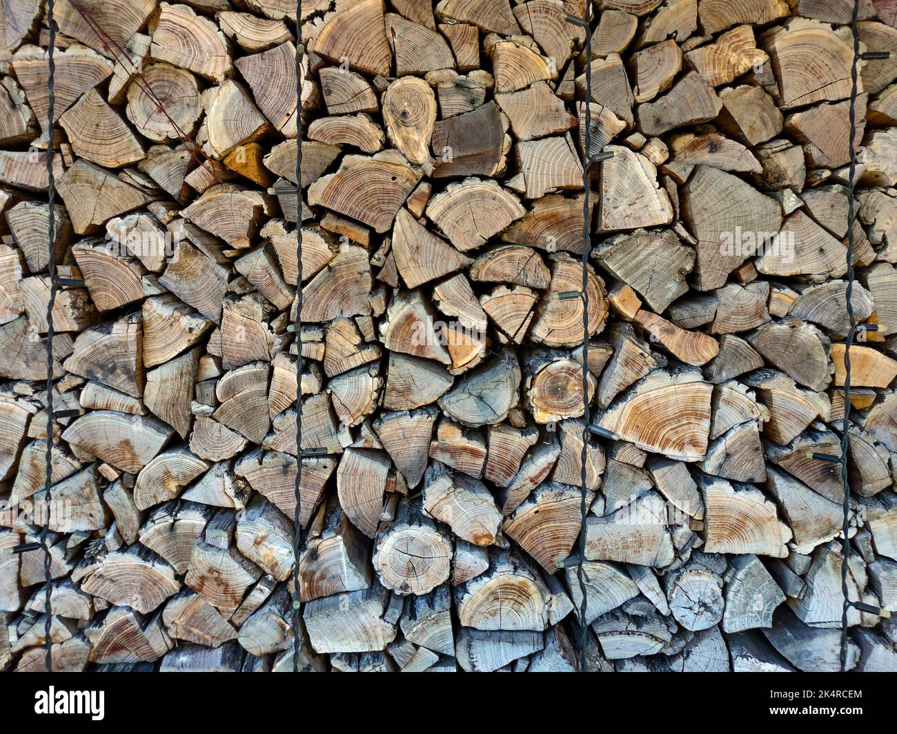 Chopped firewood stacked. Finely chopped and stacked firewood ...
