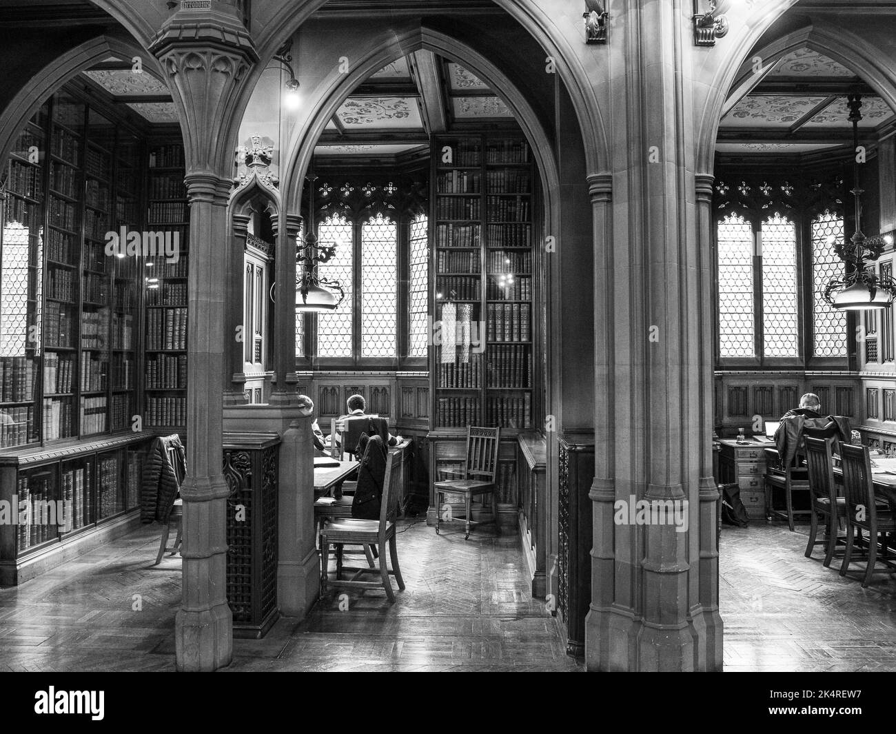 A grayscale shot of a library with vintage design and decoration Stock ...