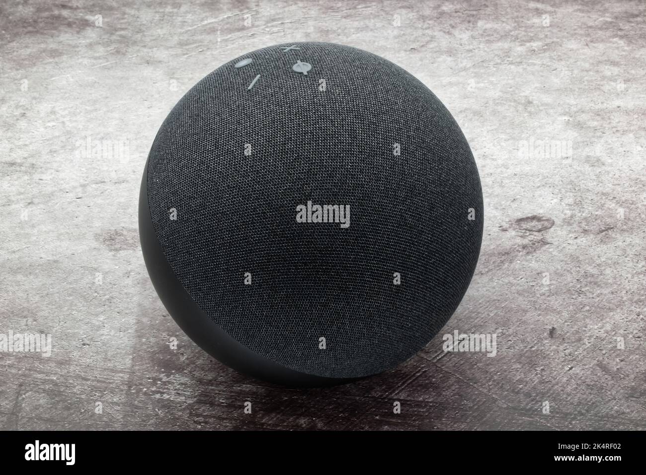 Amazon Echo Dot. Alexa, virtual assistant AI. Grey concrete background ...