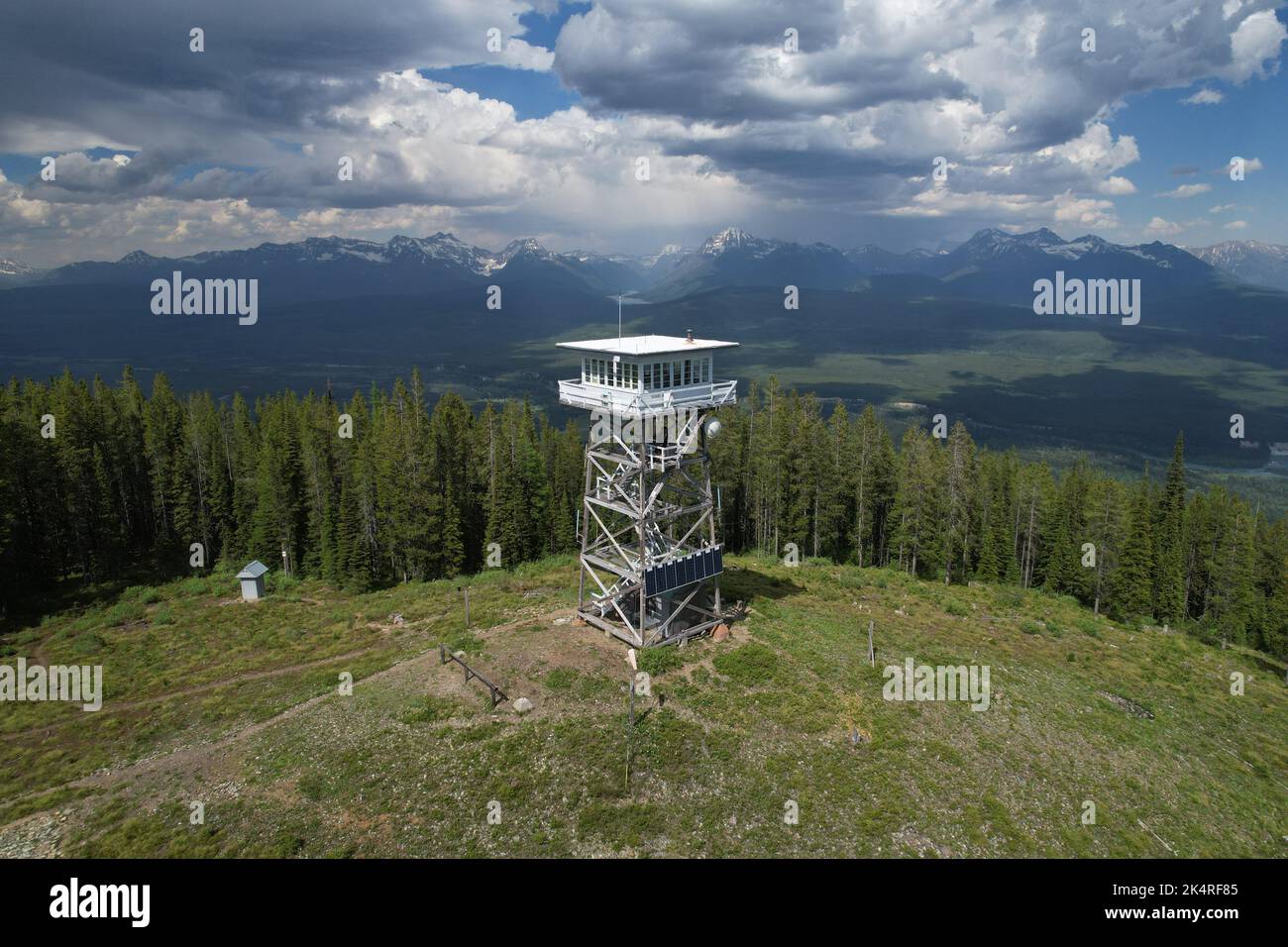 An aerial shot of Montana Fire Lookout tower with Glacier National Park ...
