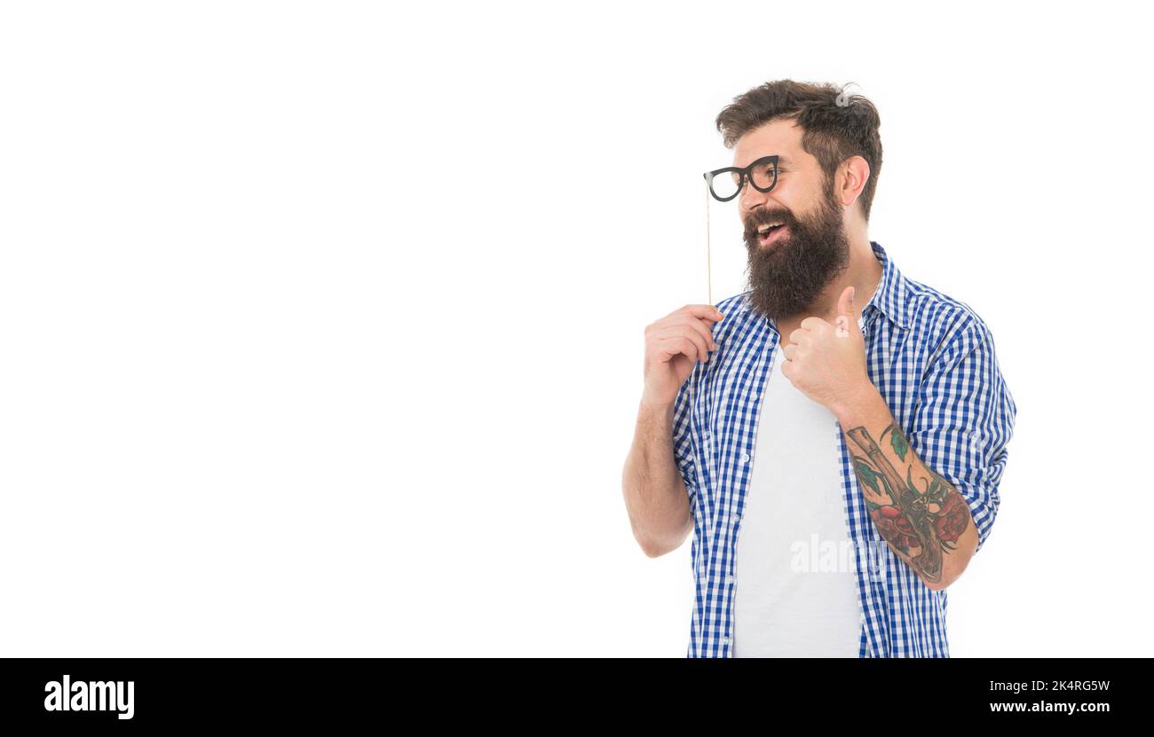 Happy smiling bearded man guy making fun with party glasses props ...