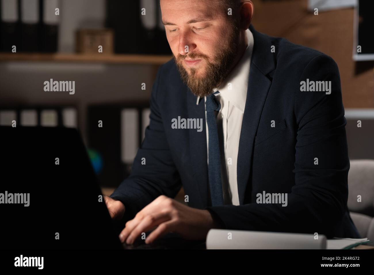 Portrait of Detective processing evidence in office, working on ...