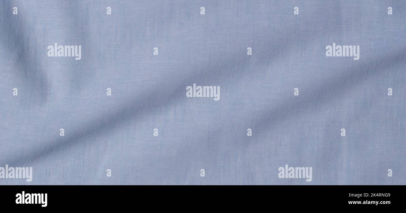 Abstract crumpled linen fabric texture background. Natural light blue ...