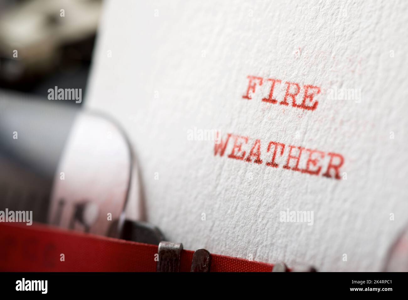 Fire weather text written with a typewriter Stock Photo - Alamy