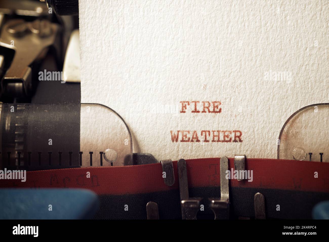 Fire weather text written with a typewriter Stock Photo - Alamy