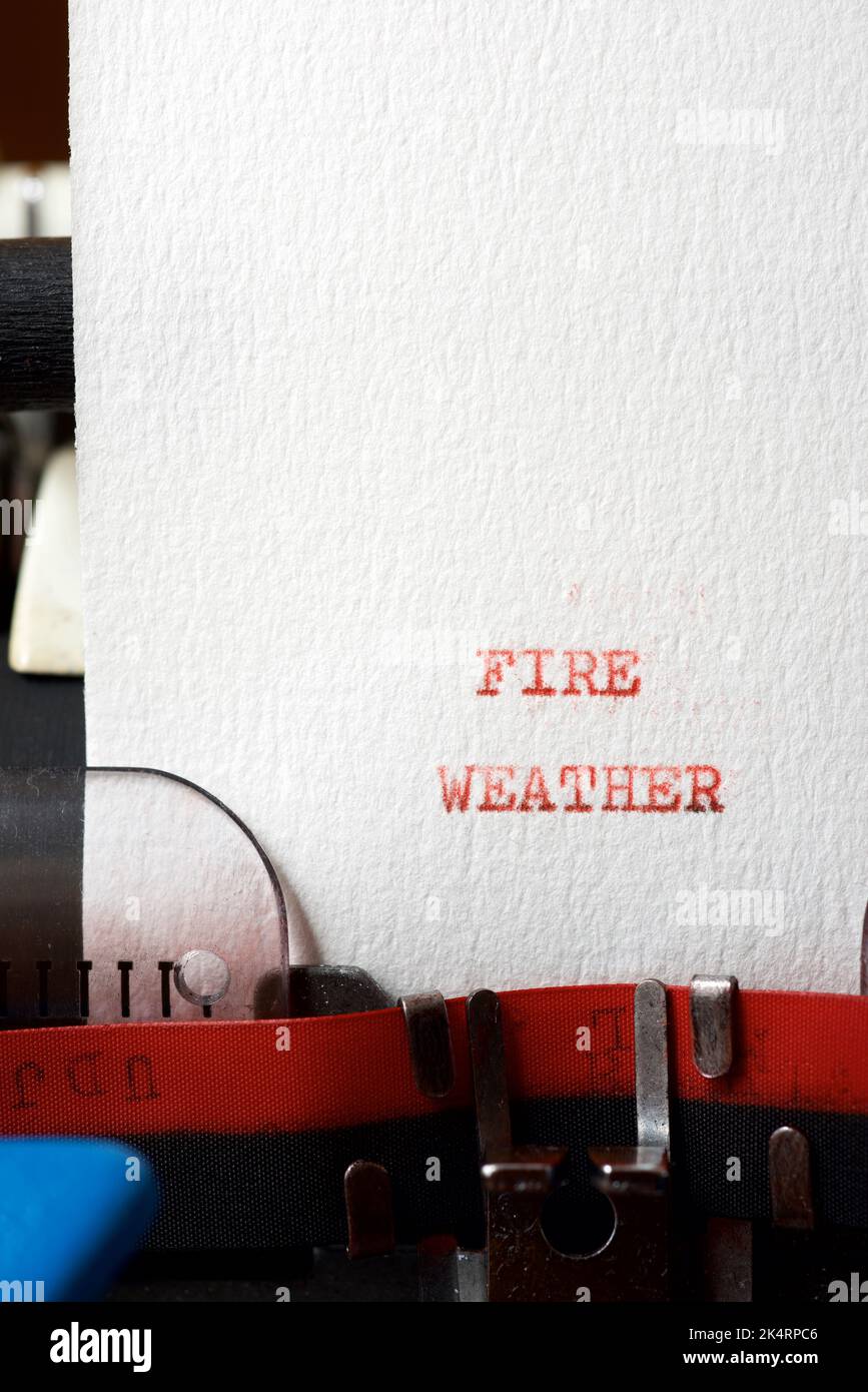 Fire weather text written with a typewriter Stock Photo - Alamy