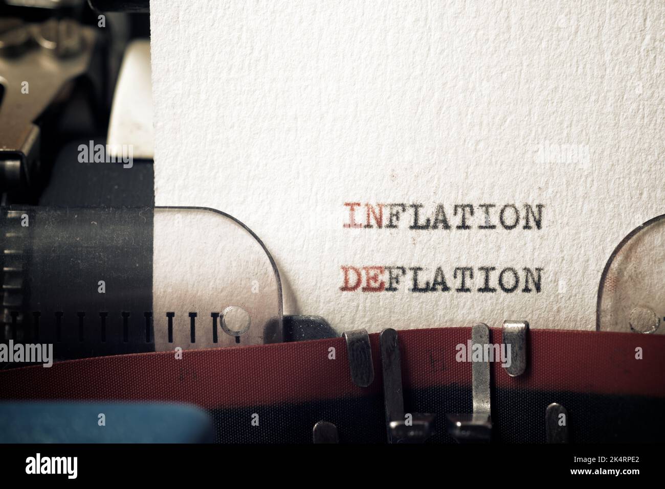 The words inflation and deflation written with a typewriter Stock Photo ...