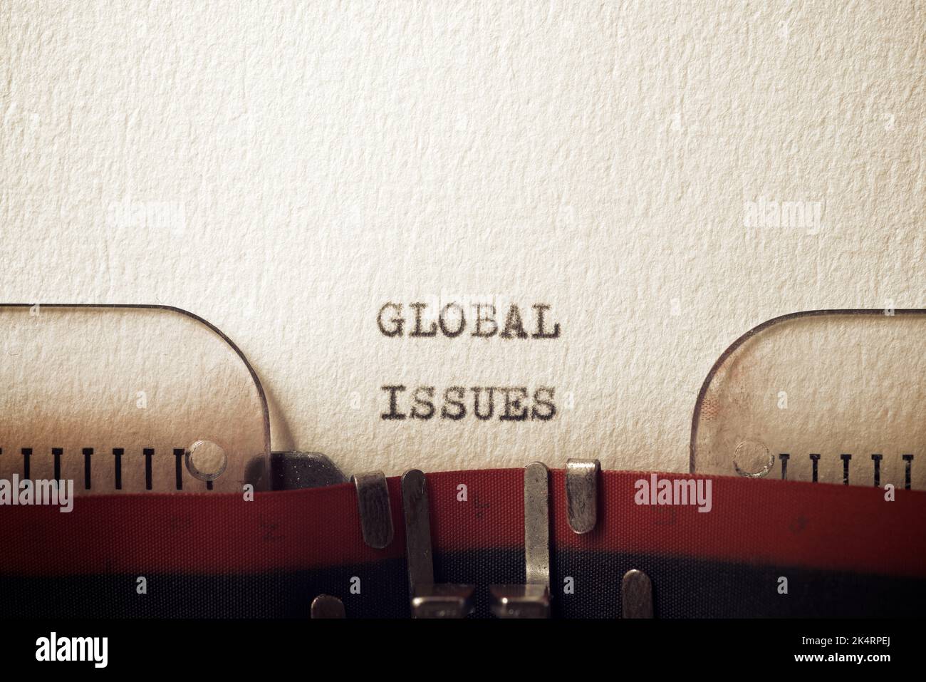 Global issues text written with a typewriter Stock Photo - Alamy