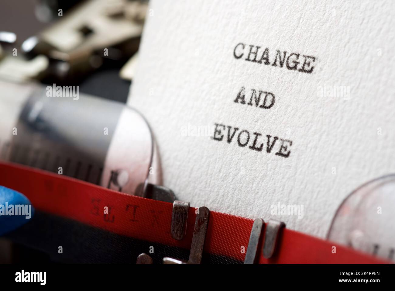 Change and evolve text written with a typewriter Stock Photo - Alamy