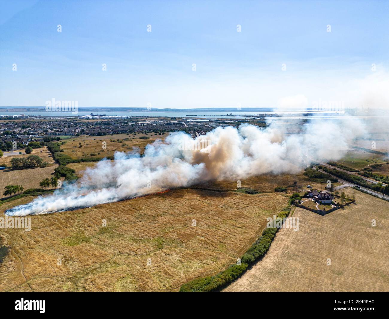 Smoke from Grass Fire Stock Photo - Alamy