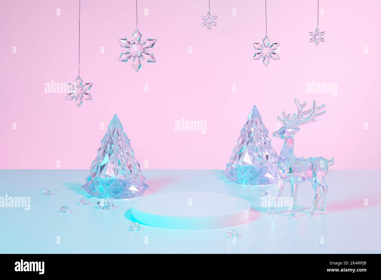 Winter scene with Christmas decorations on holographic pink background ...