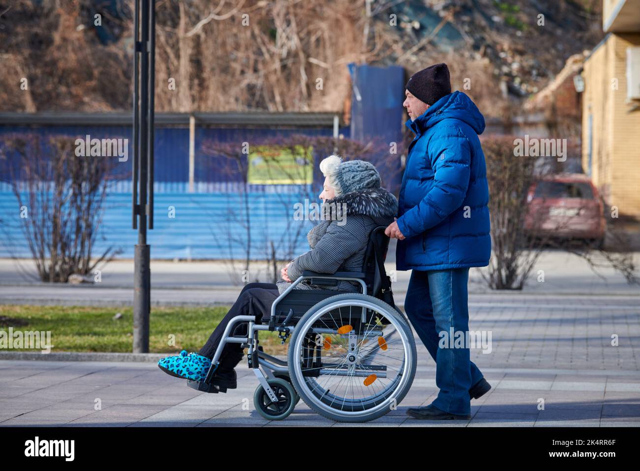 Rostov on Don, Russia - 02.18.2022 - Adult man rolls his disabled ...