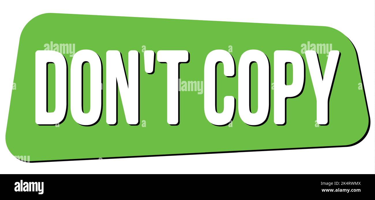 DON'T COPY text written on green trapeze stamp sign Stock Photo - Alamy