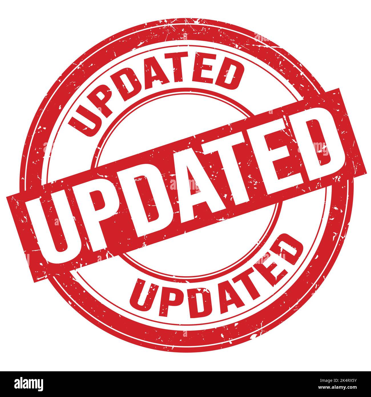 UPDATED text written on red round grungy stamp sign Stock Photo - Alamy