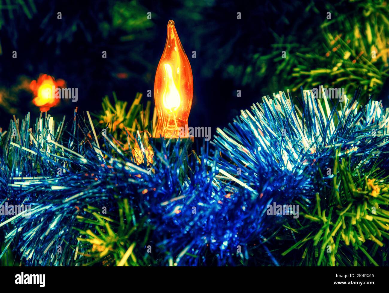 Christmas light shinning on decorated christmas tree Stock Photo - Alamy