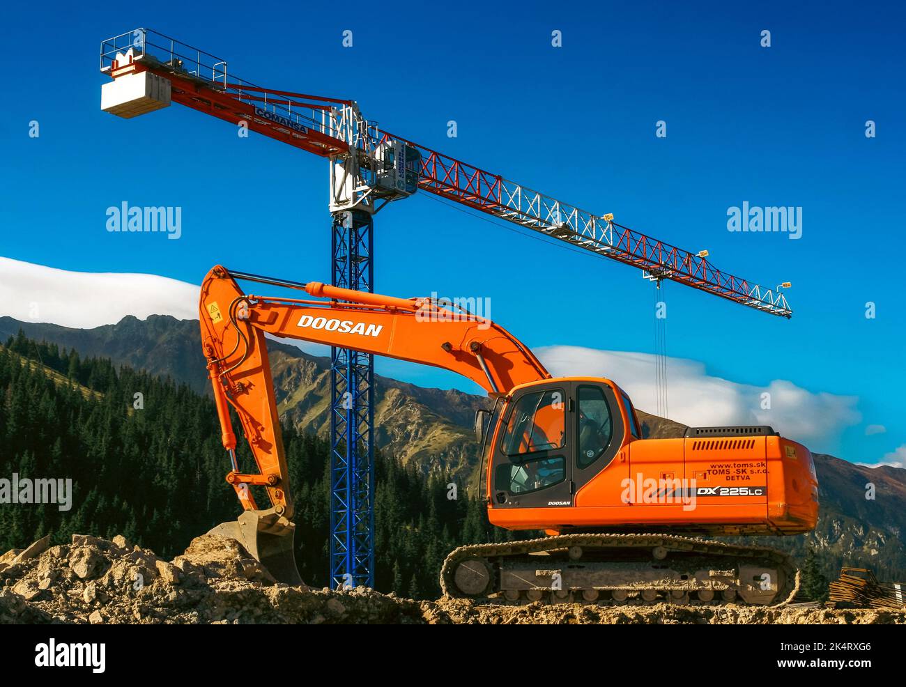 Liptovsky Mikulas, Slovakia - September 11,, 2011: Excavator and crane ...
