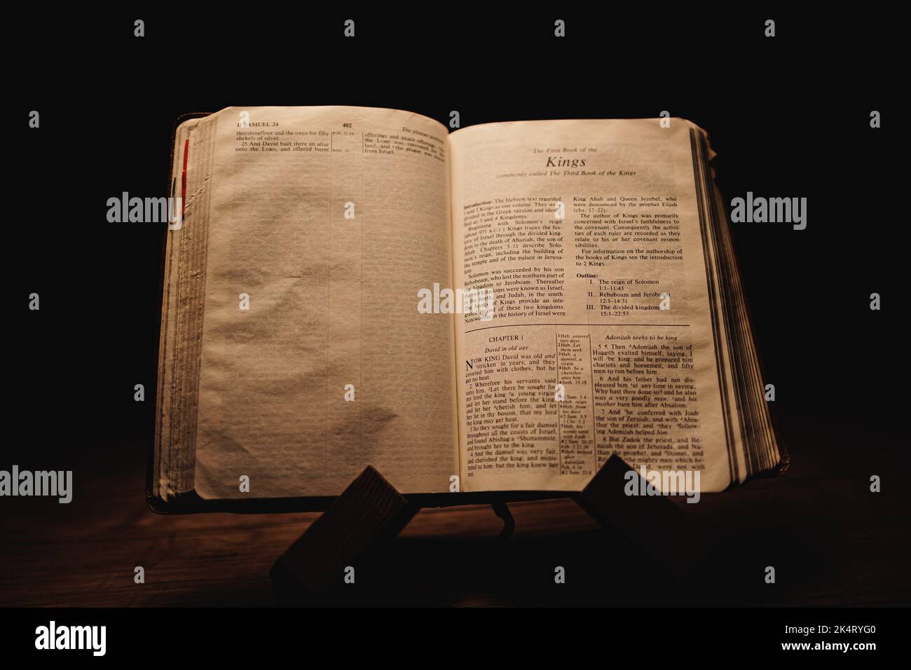 A closeup shot of a historic old Bible open on the Kings pages on ...