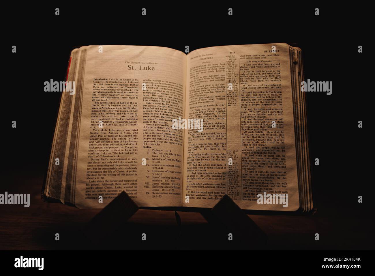 A closeup shot of a historic old Bible open on the St. Luke pages on ...