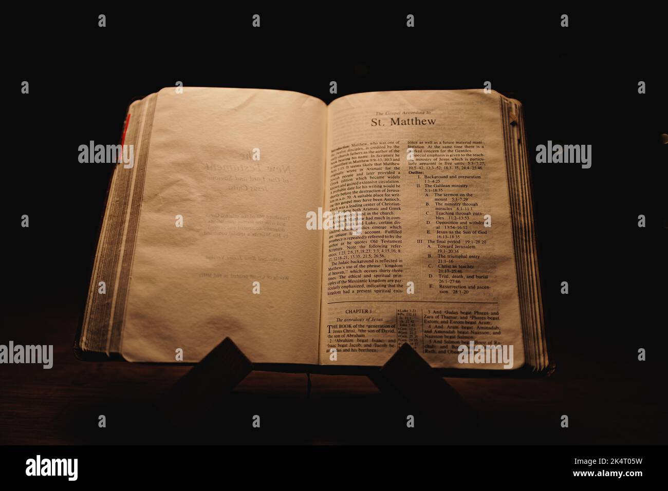 A closeup shot of a historic old Bible open on the St. Matthew pages on ...