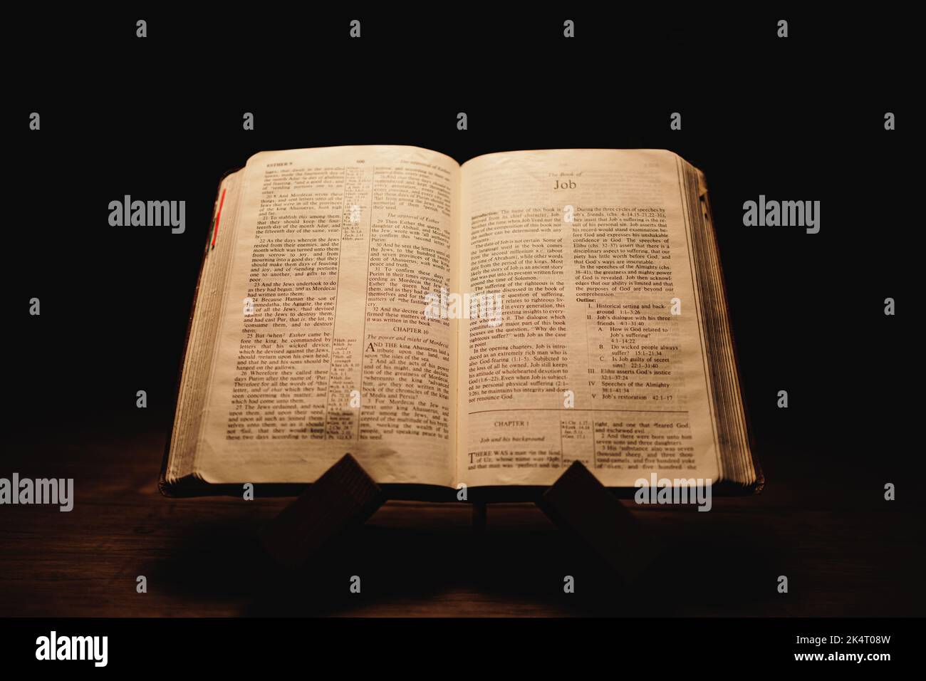 A closeup shot of a historic old Bible open on the Job pages on display ...