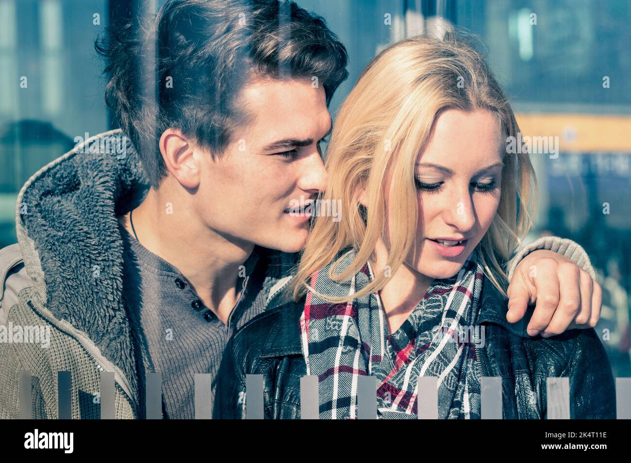 Whispering in ear behind hi-res stock photography and images - Alamy