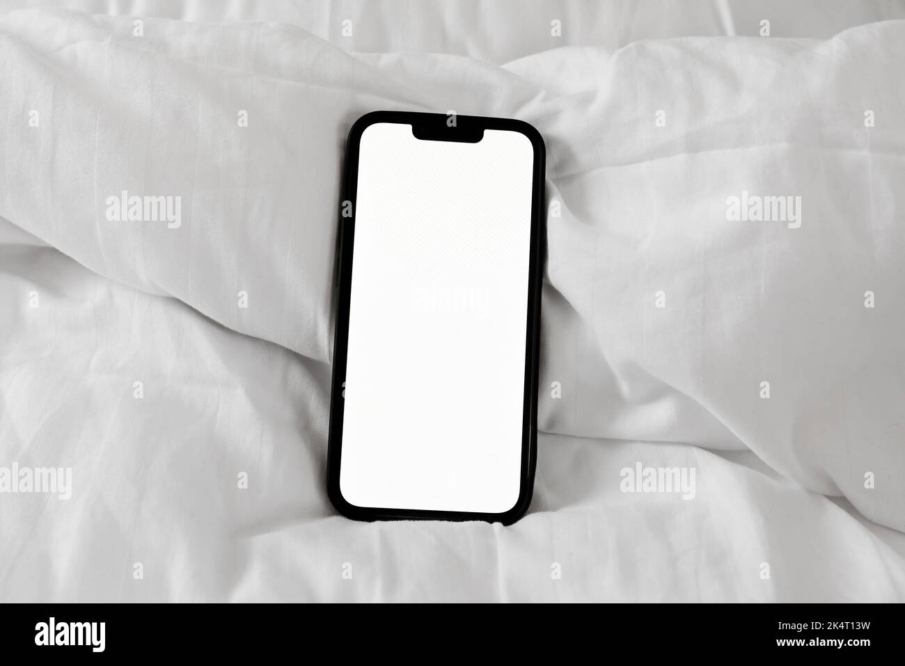 Smartphone mockup screen on white bed sheet, top view flat lay Stock ...