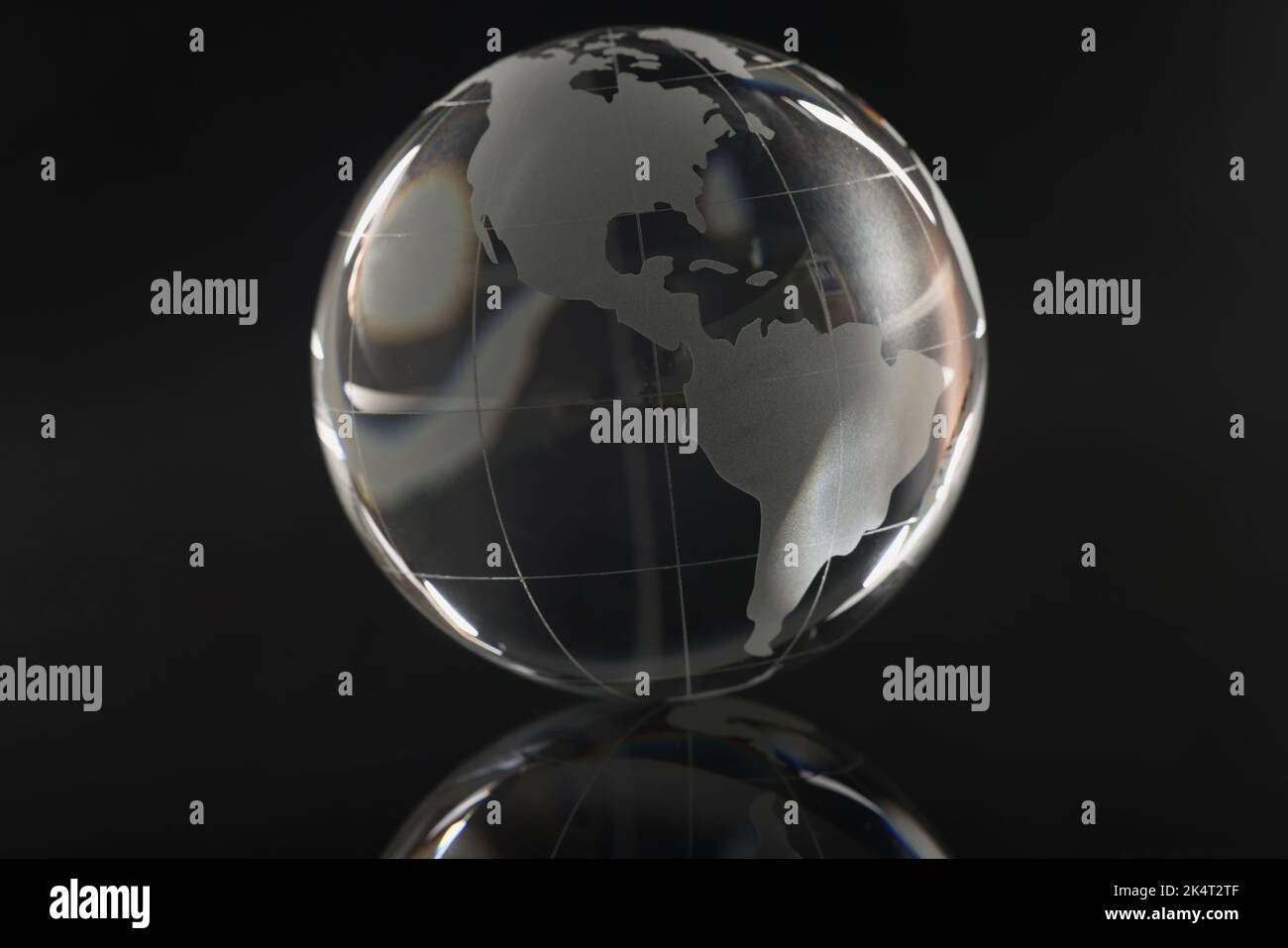 Glass globe on a black background, reflection of a circle Stock Photo ...