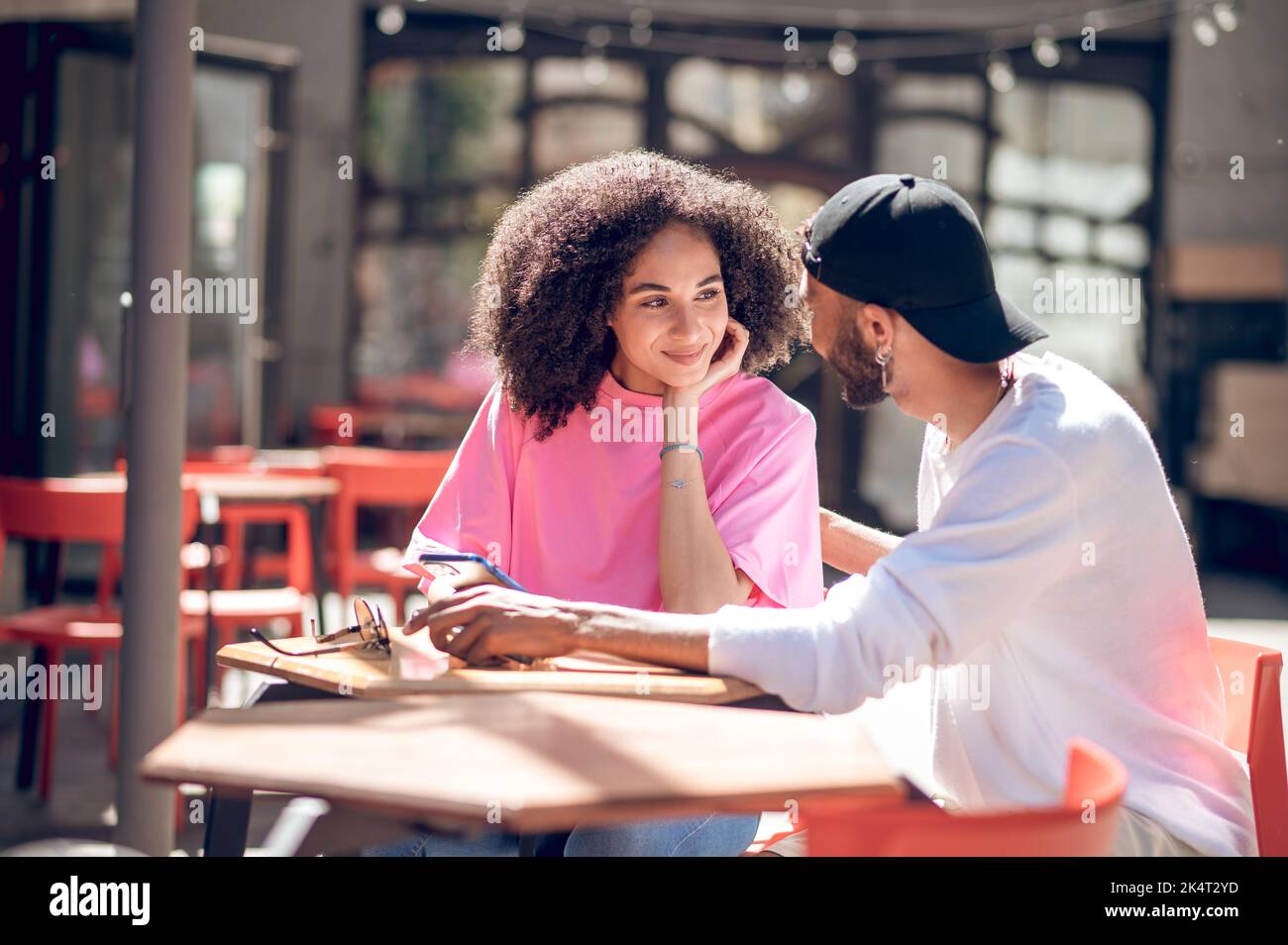 Two people look at each other hi-res stock photography and images - Alamy