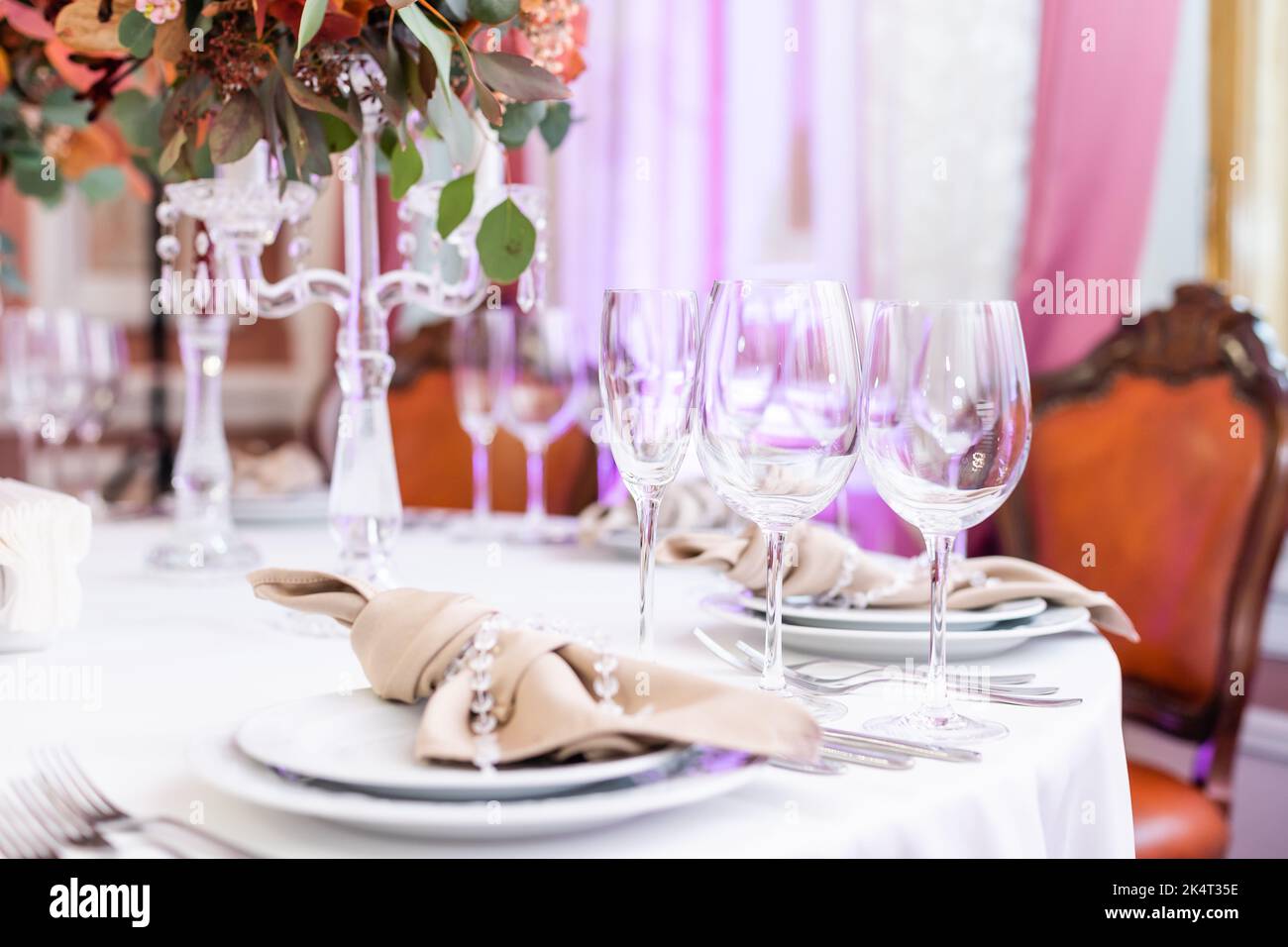Beautiful table setting with floral decor Stock Photo - Alamy