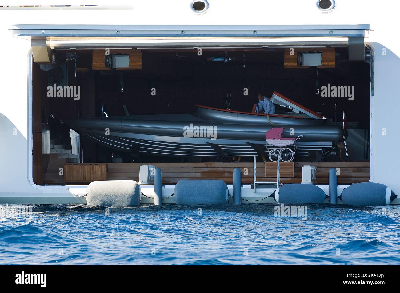 Tender to Mega Yacht A, Hamilton at anchor in Chia and Forte Village ...