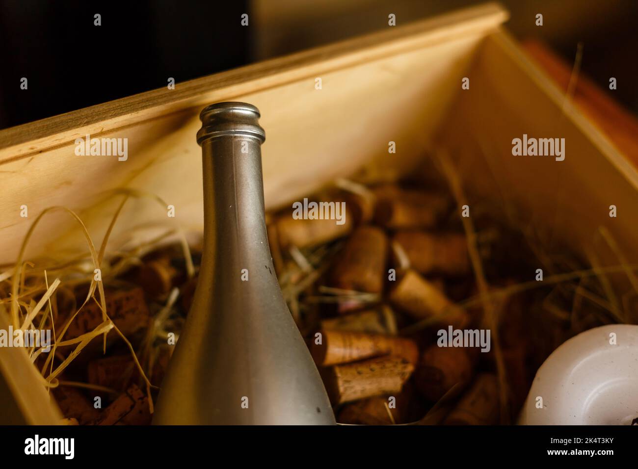 Wooden box with empty wine bottles, bottles blurred Stock Photo - Alamy
