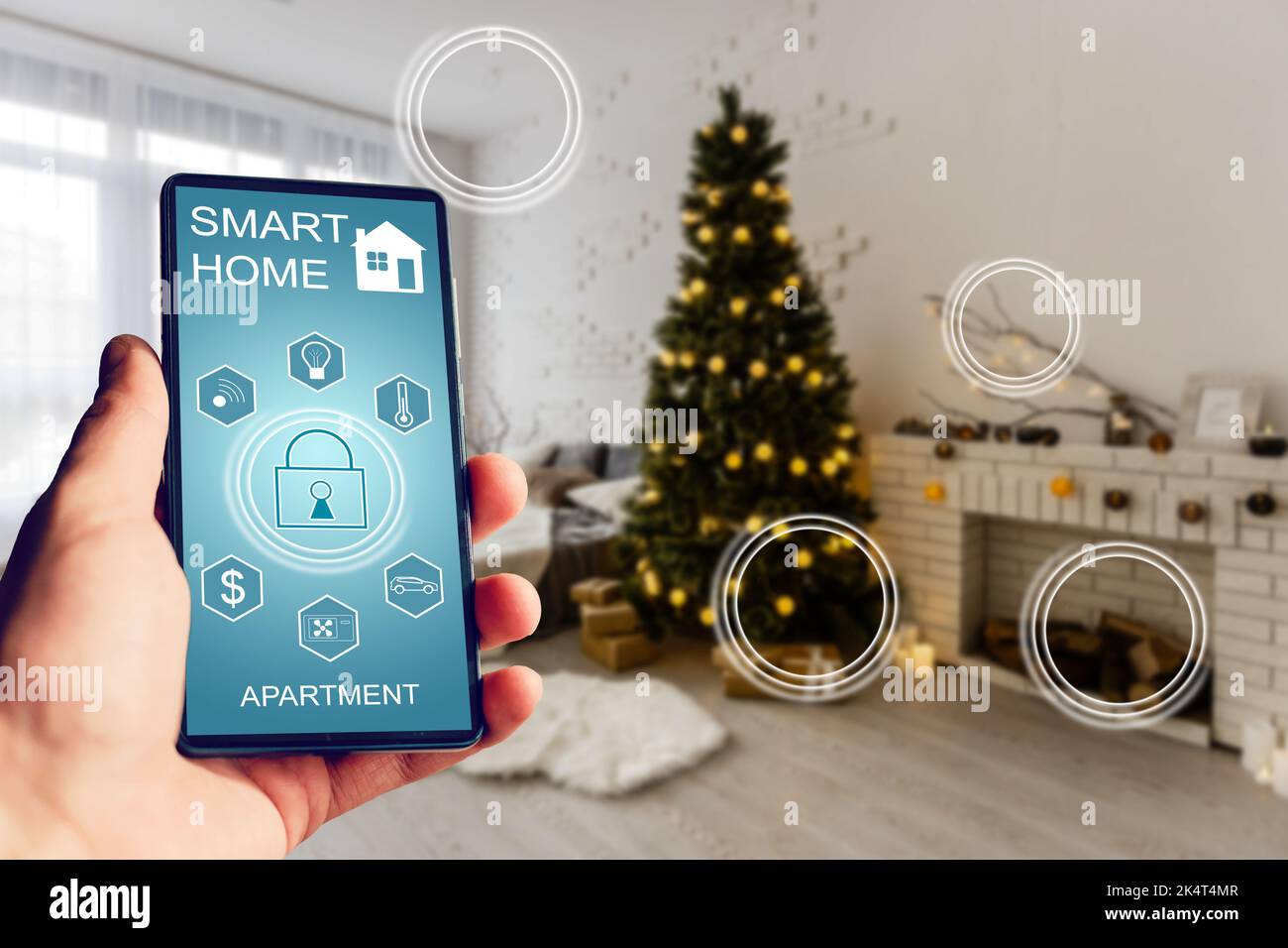 Smart home technology interface on smartphone app screen with augmented ...