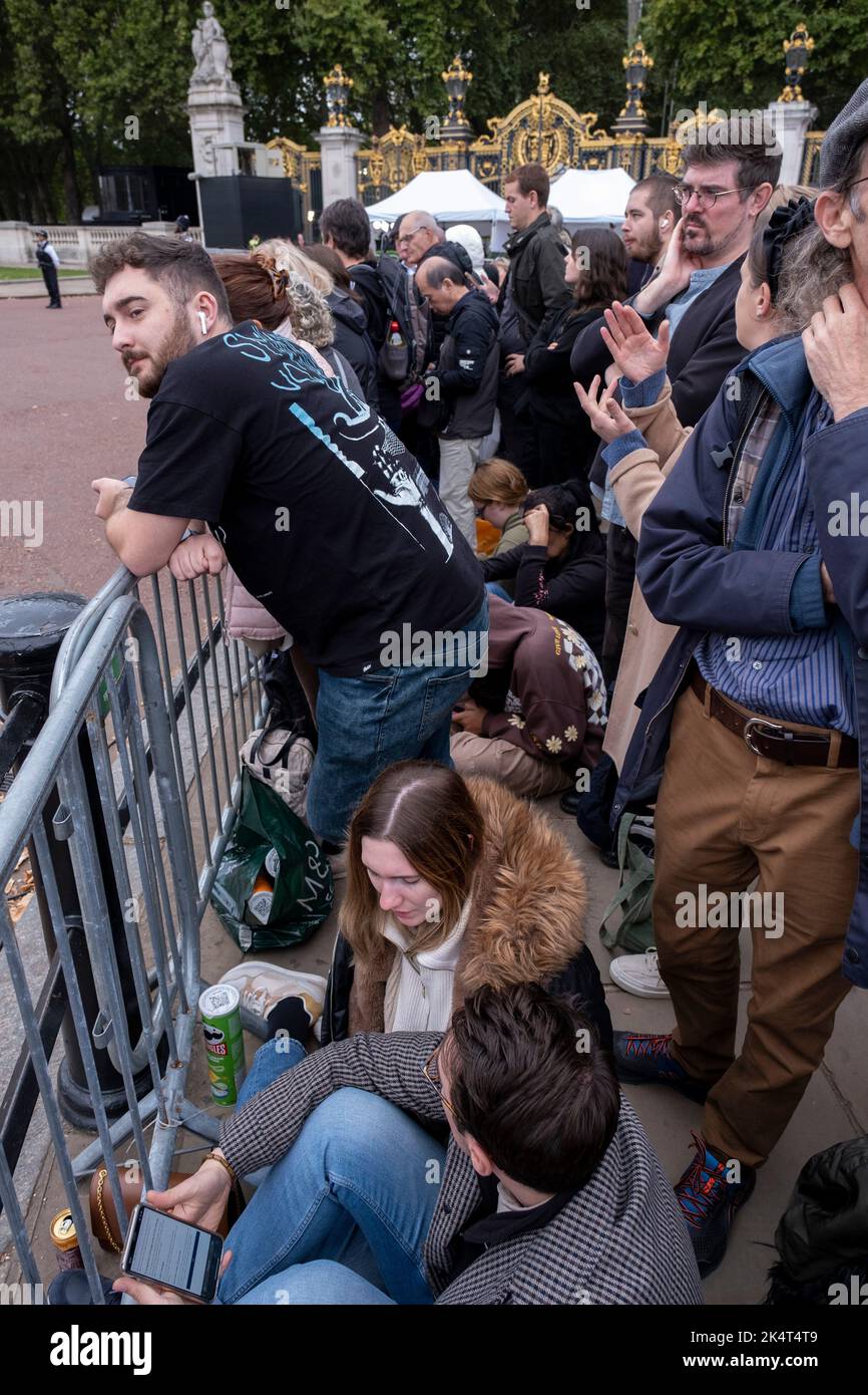 Members of the public sit and stand waiting for hours for the at the ...