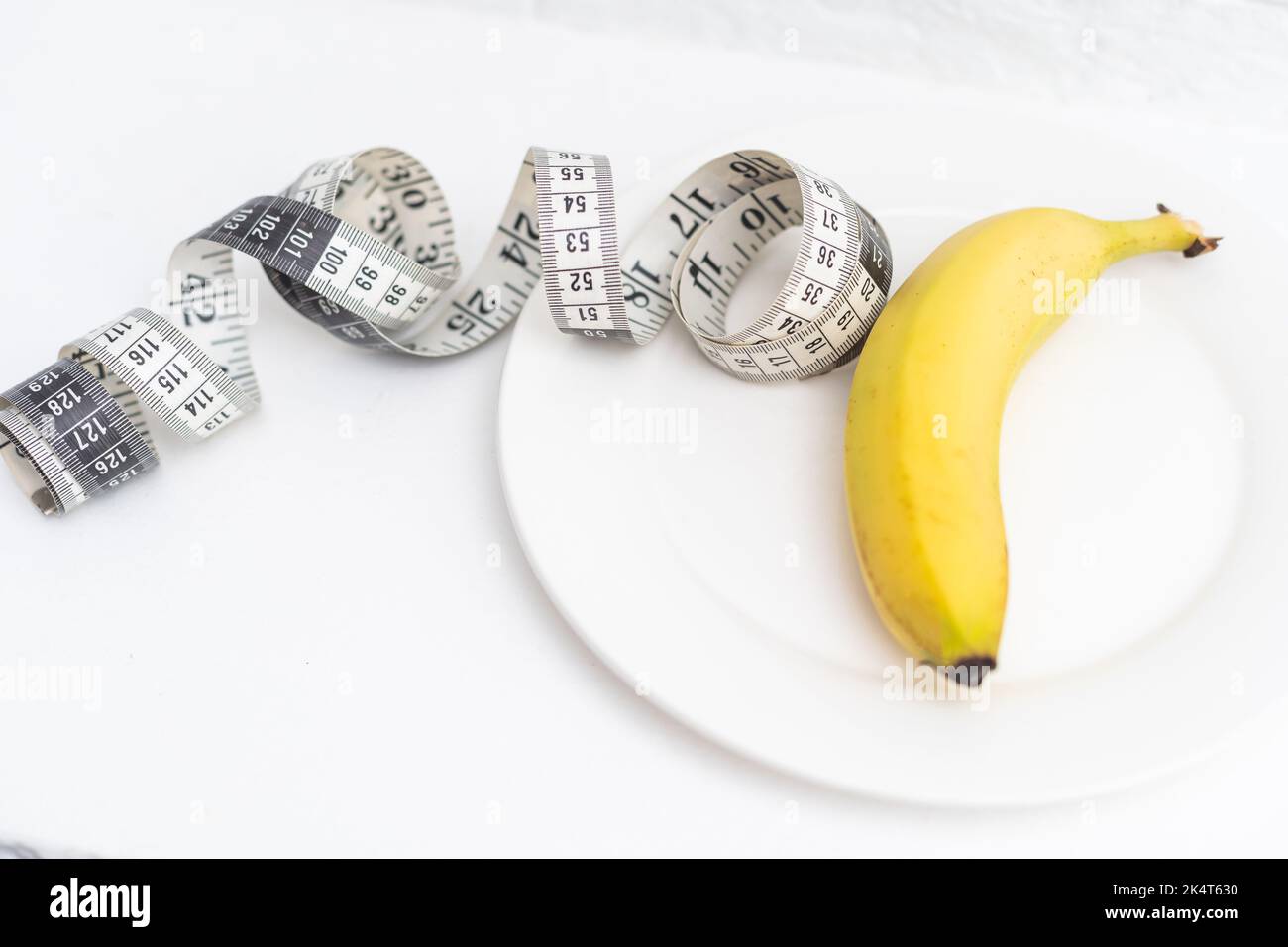 Weight scale measuring tape banana hi-res stock photography and images ...