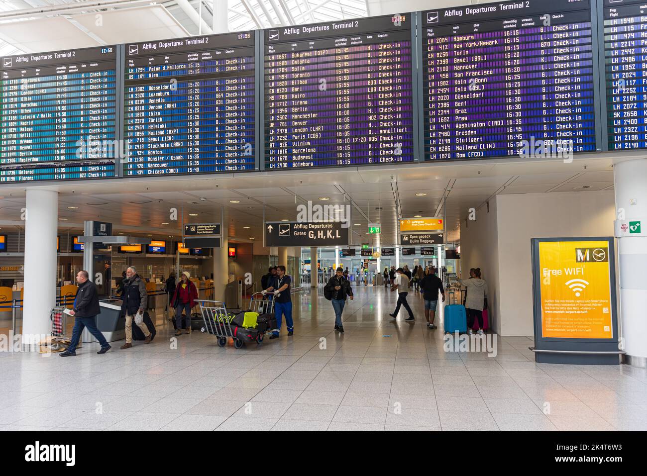 MUNICH, GERMANY - SEPTEMBER 29, 2022: Departing flights billboard at ...