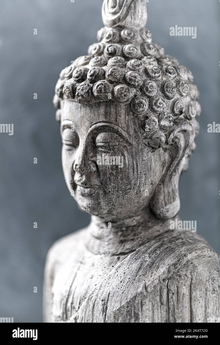 Meditating Buddha Statue on bright background. Close up Stock Photo - Alamy