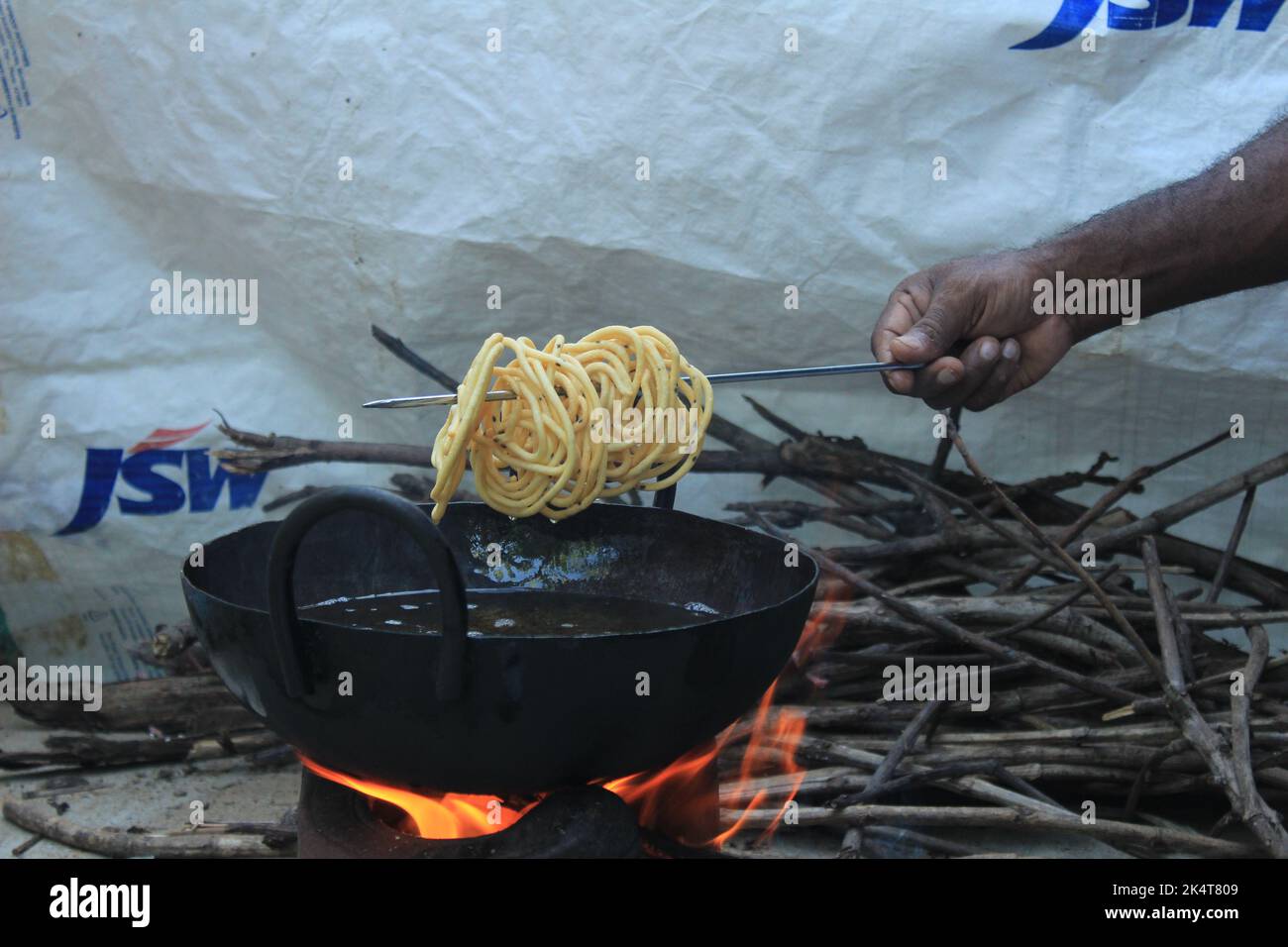 Preparing South Indian Homemade rice Murukku for Diwali festival snacks ...