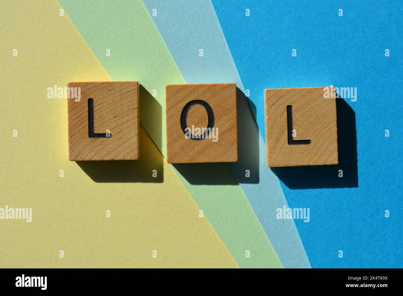 LOL, acronym for Lots of Laughs, letters in wooden alphabet letters ...