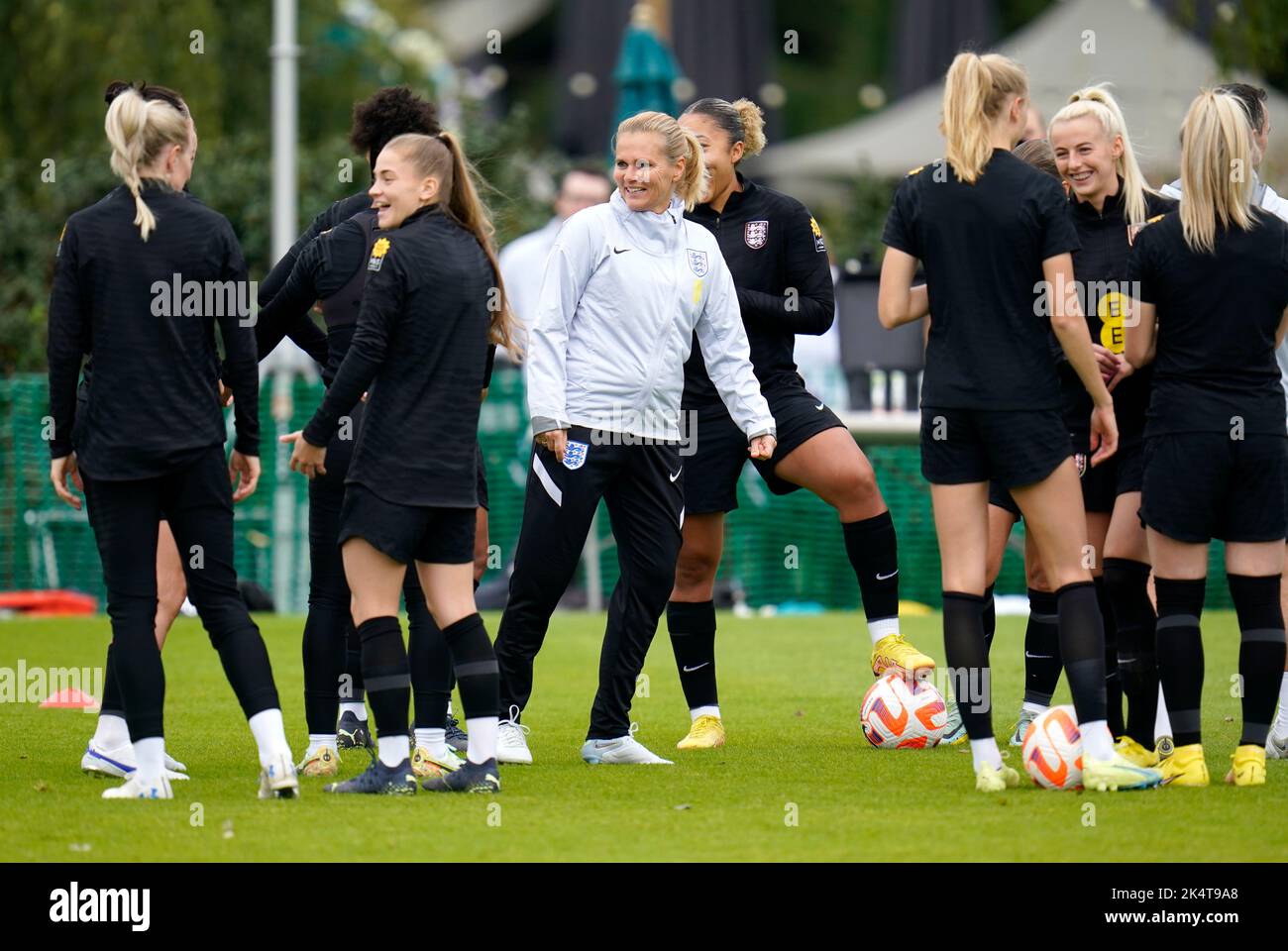 England head coach Sarina Wiegman (centre) during a training session at ...